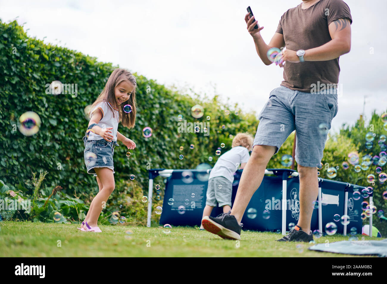 Father son walking past hi-res stock photography and images - Alamy