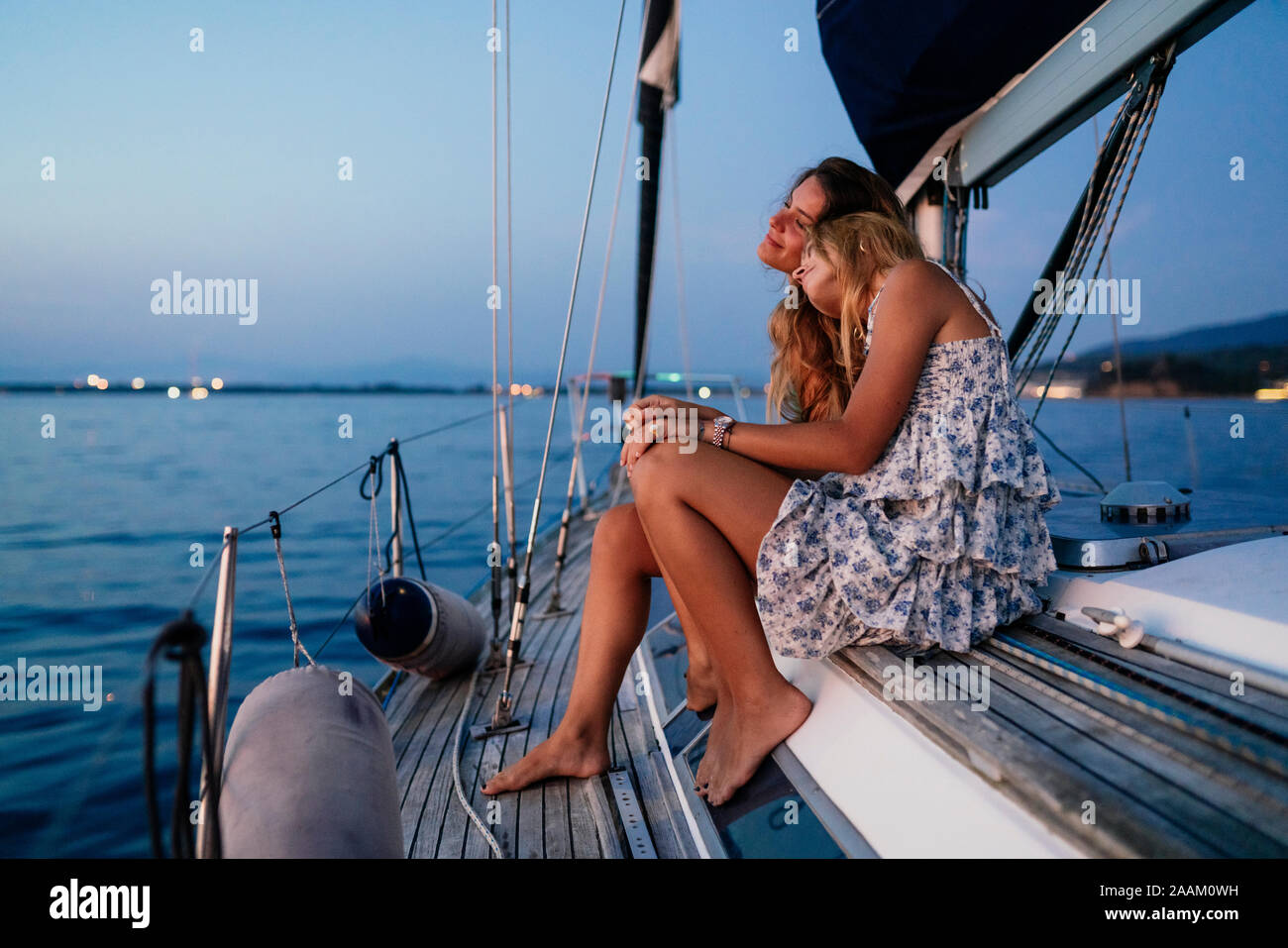 Young woman relaxing on sailboat hi-res stock photography and images ...