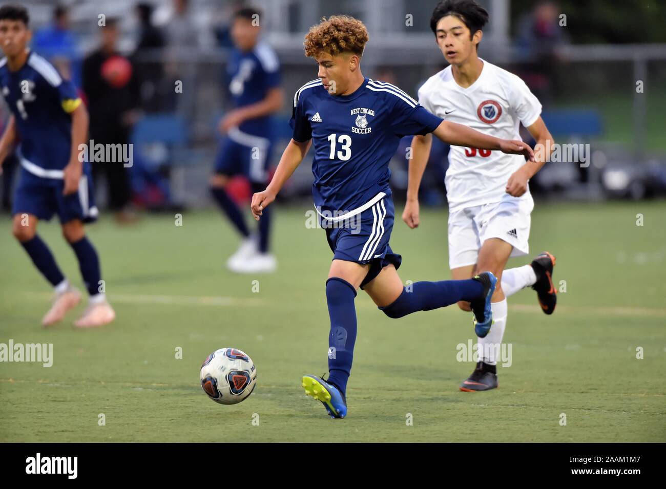 Boys dribbling football hi-res stock photography and images - Alamy