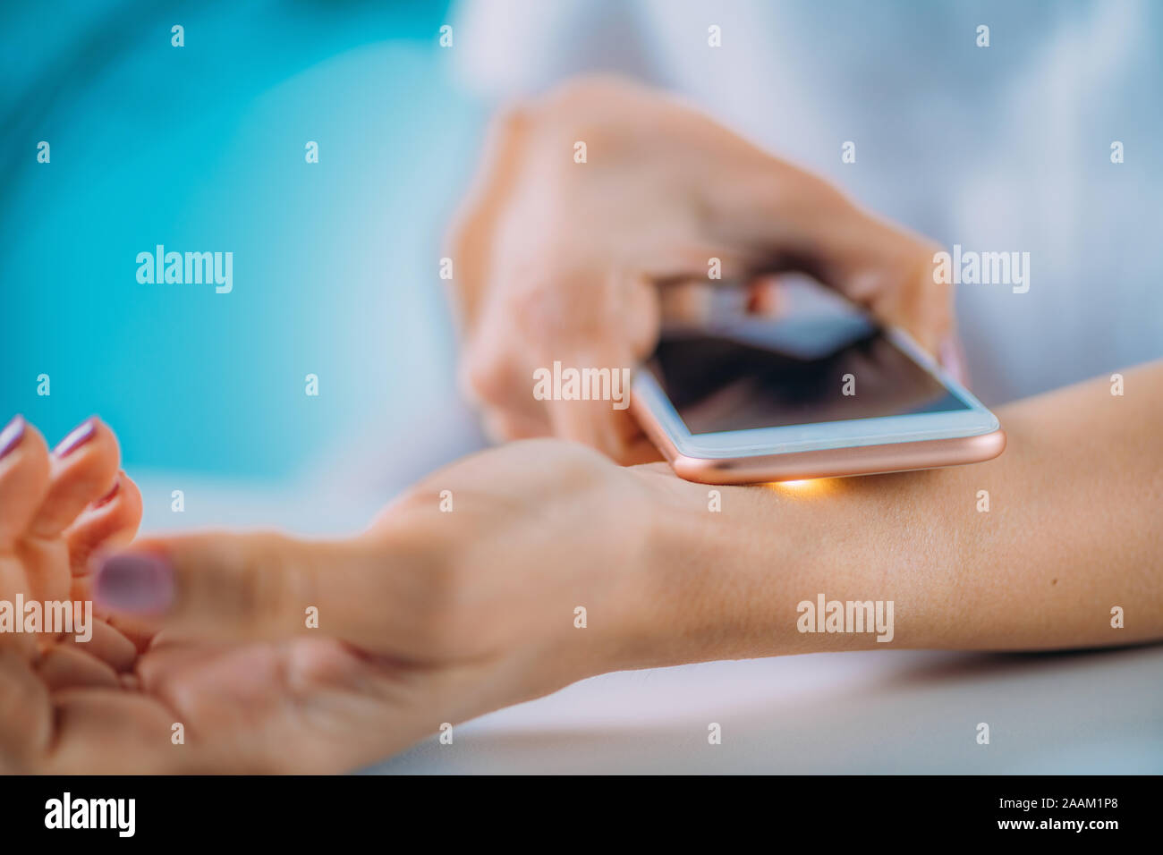 Measuring heart rate using back camera on a smart phone Stock Photo - Alamy