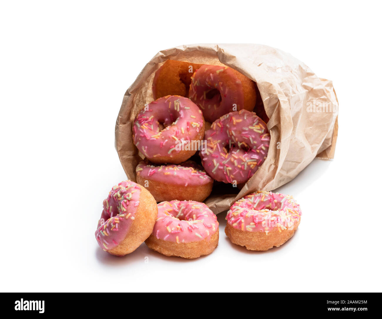 Mini pink glazed doughnuts in paper bag isolated on white Stock Photo ...