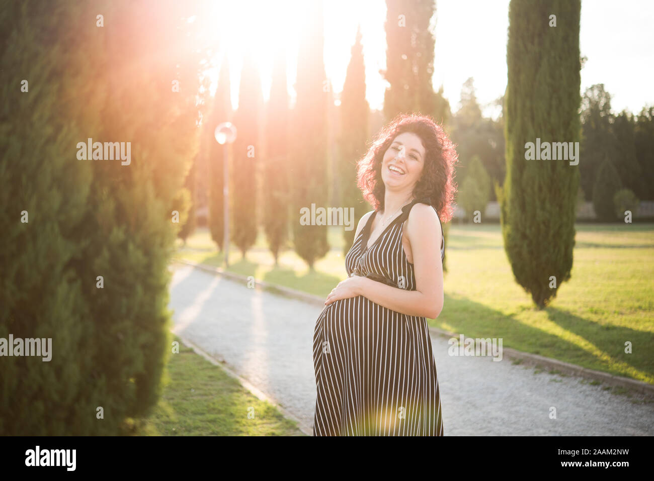 Hand resting on stomach hi-res stock photography and images - Alamy