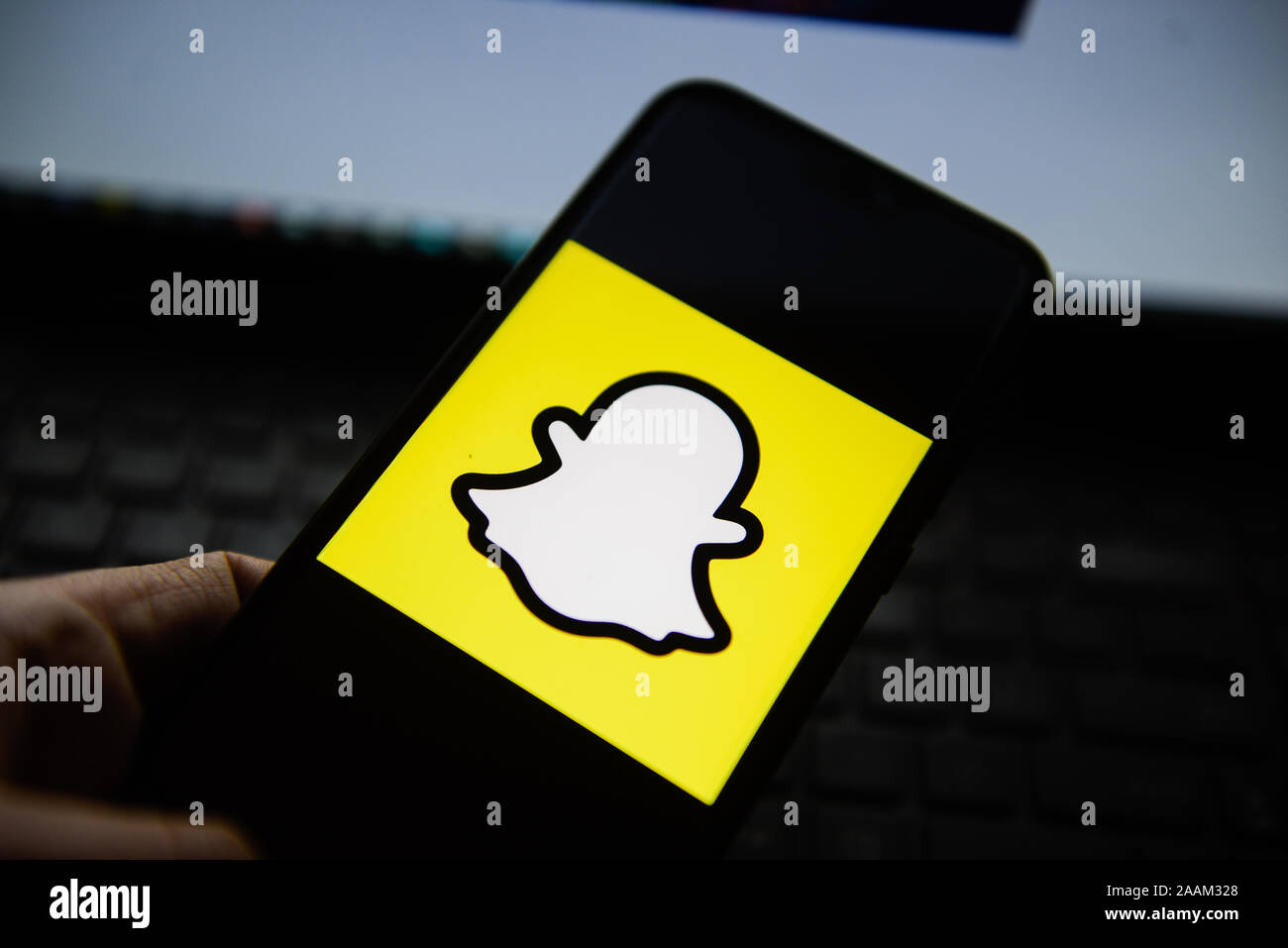 In this photo illustration a Snapchat logo seen displayed on a ...