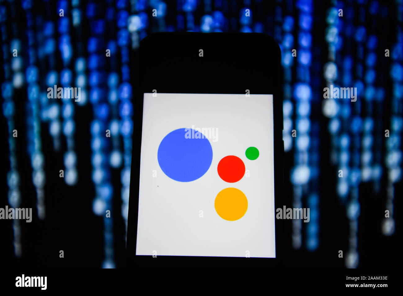 In this photo illustration a Google Assistant logo seen displayed on a ...