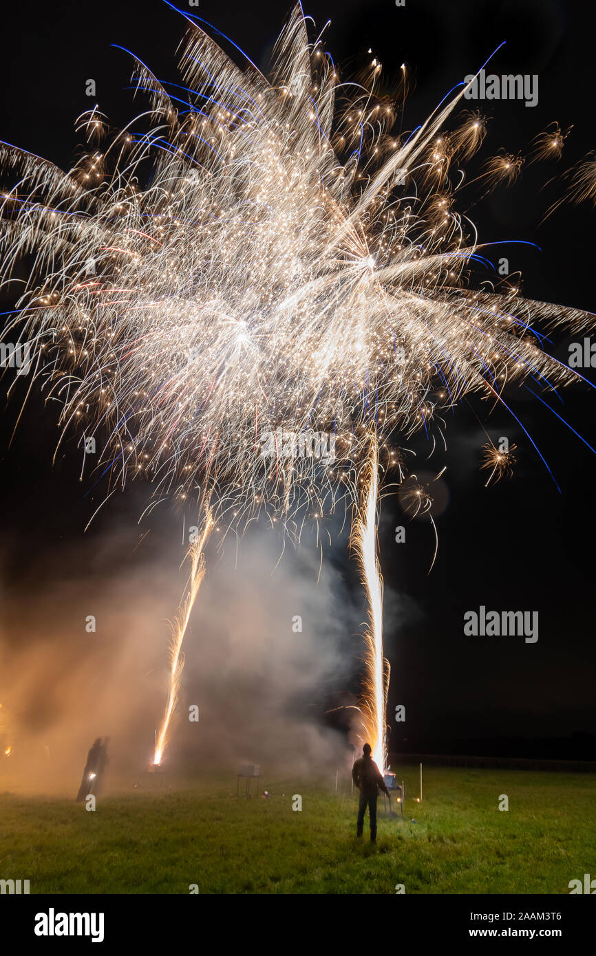 Long exosure of people letting off fireworks Stock Photo - Alamy