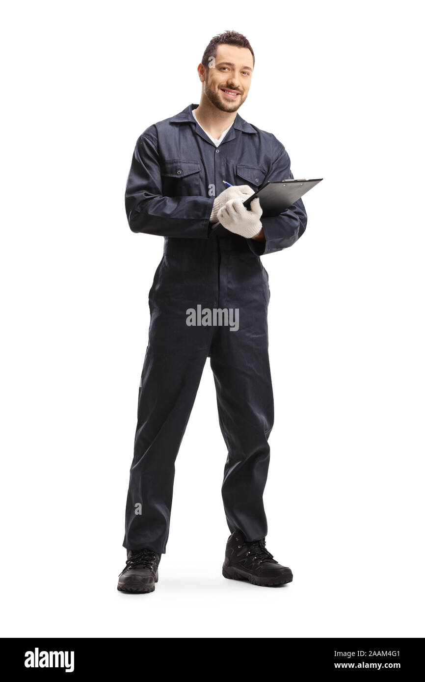 Full length portrait of an auto mechanic standing with a clipboard ...