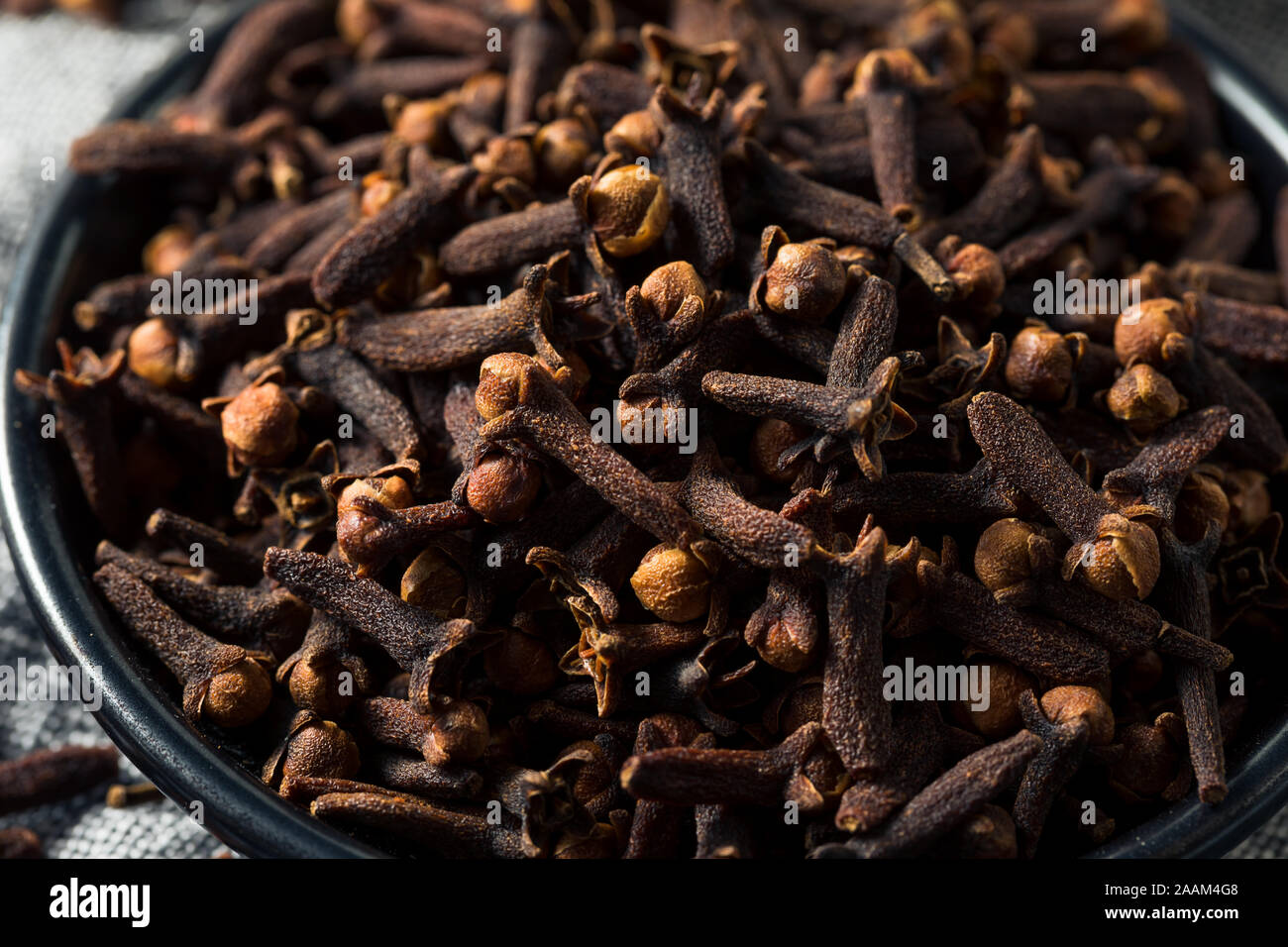 Dry Organic Clove Spice in a Bowl Stock Photo - Alamy