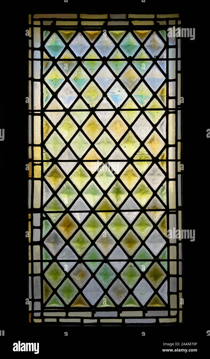 Stained glass colored windows over the historic medieval city of ...