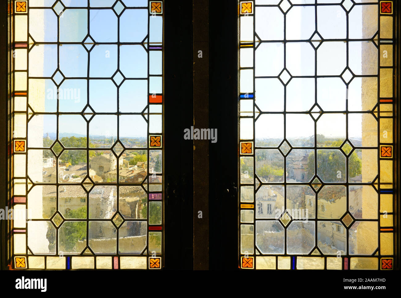 Stained glass colored windows over the historic medieval city of ...