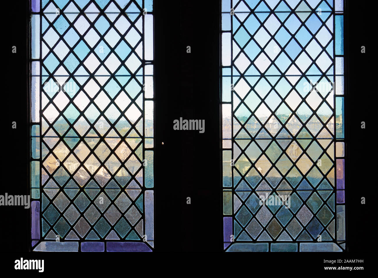 Stained glass colored windows over the historic medieval city of ...