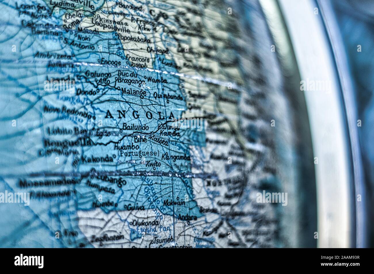An old map of Angola on an antique globe Stock Photo - Alamy