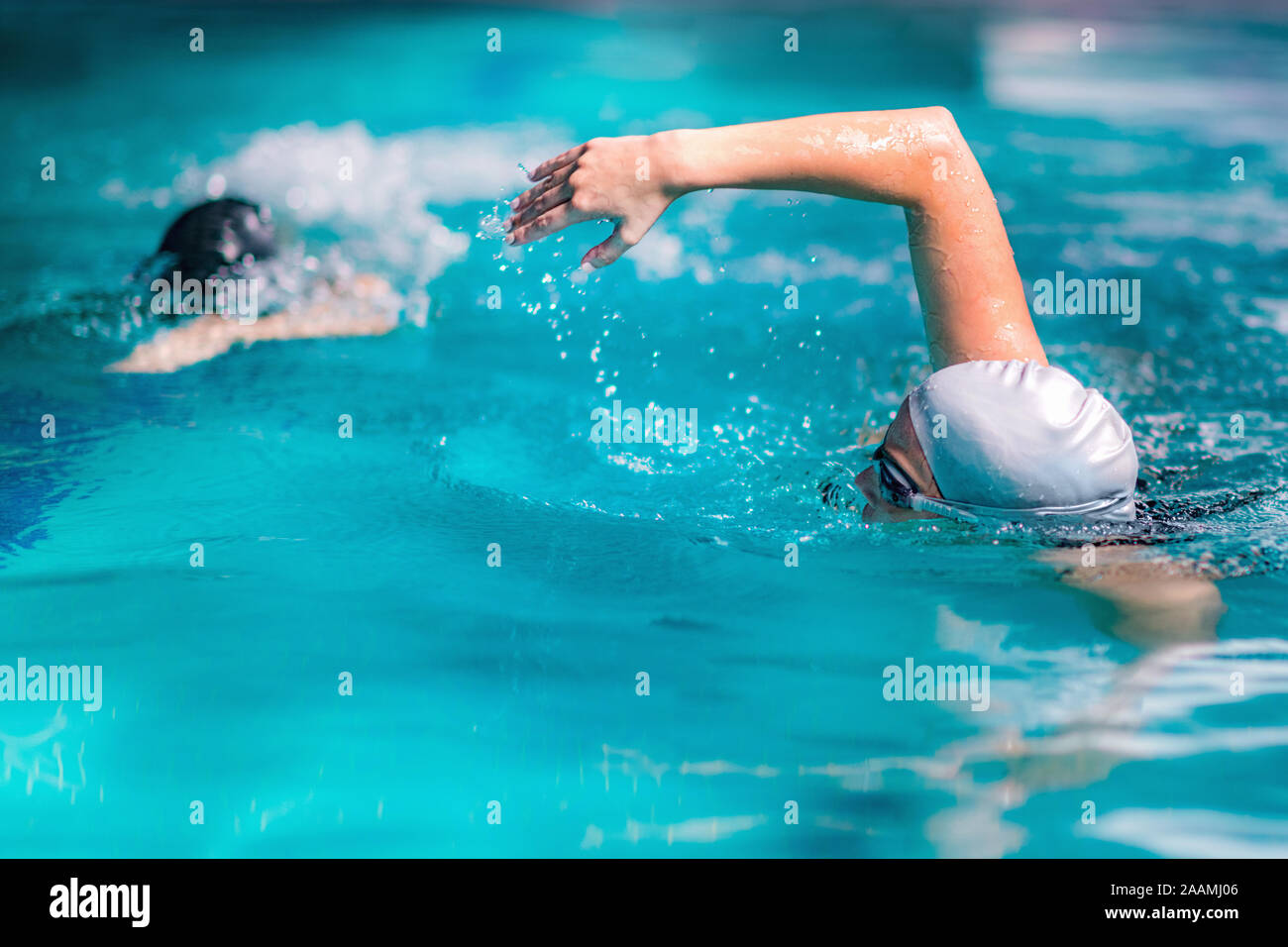 Women in indoor swimming pool Stock Photo - Alamy