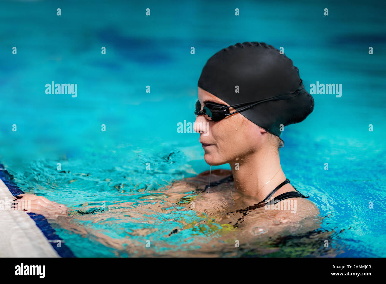 Women in indoor swimming pool Stock Photo - Alamy