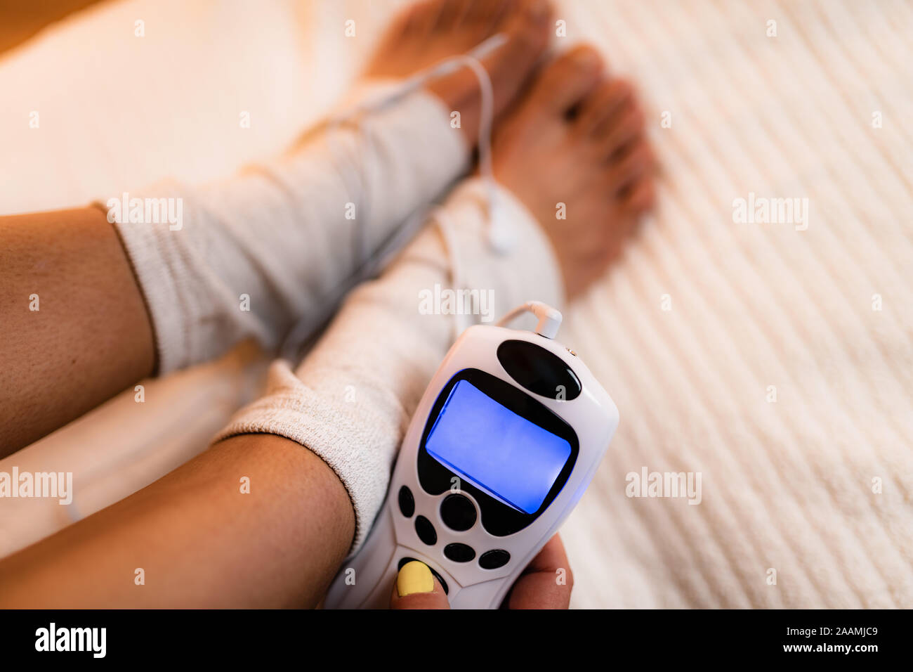 Woman tens machine hi-res stock photography and images - Alamy