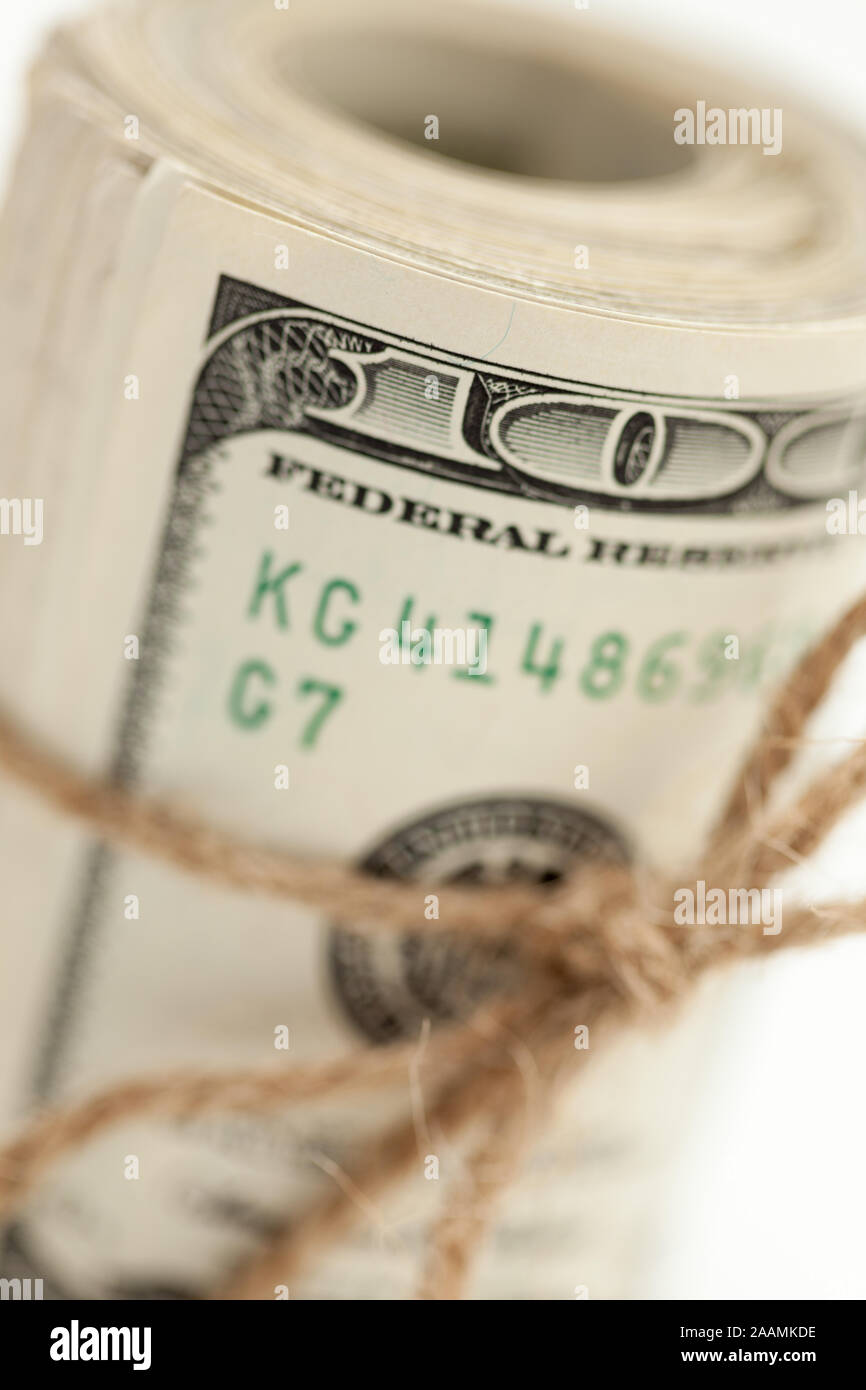 Roll of One Hundred Dollar Bills Tied in Burlap String on White Stock ...