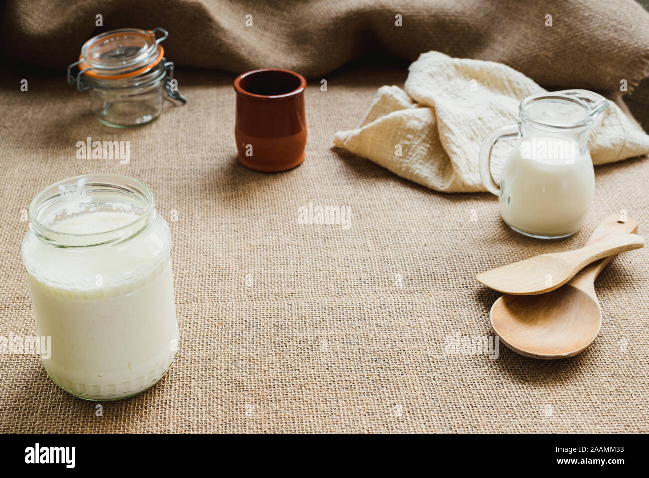 Milk kefir prepared at home, process of separating the grains from the ...