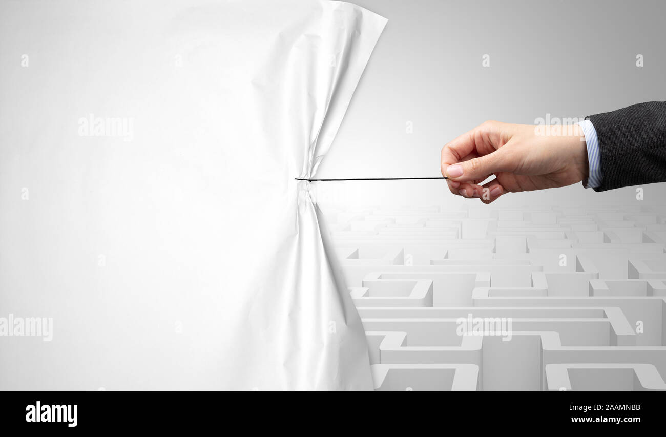 Hand pulling paper curtain, changing scene concept Stock Photo - Alamy