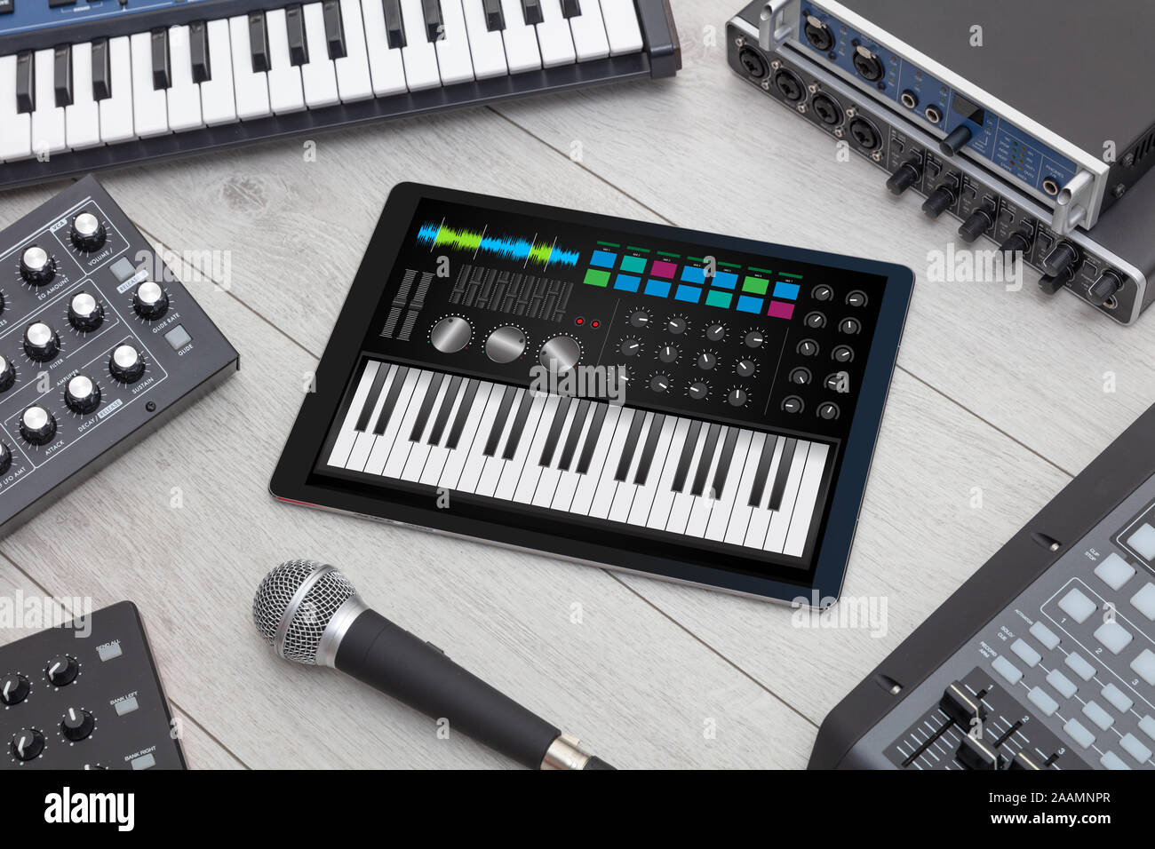 Piano synthesizer app on tablet and musical instrument concept Stock ...