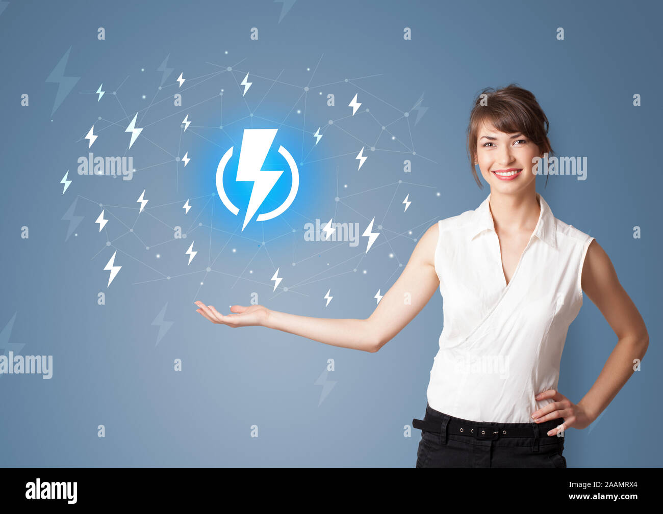 Young smiling person presenting battery life concept Stock Photo - Alamy