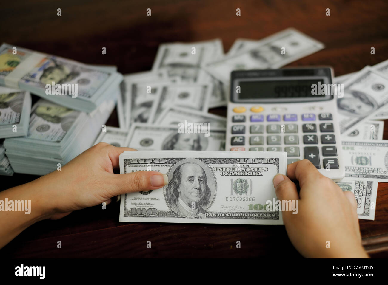 Women Lots Of Money High Resolution Stock Photography and Images - Alamy