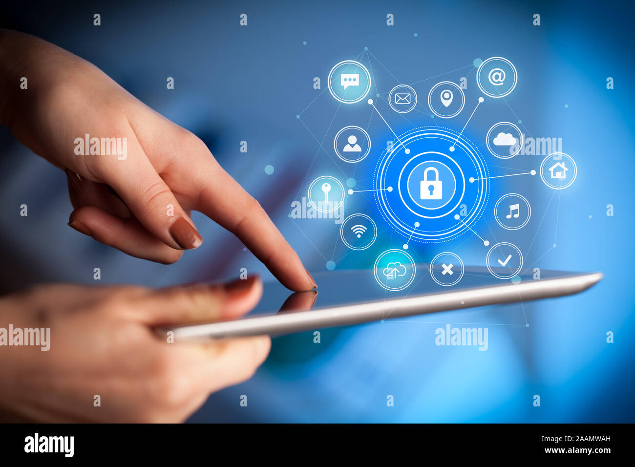 Hand holding tablet with online security concept Stock Photo - Alamy