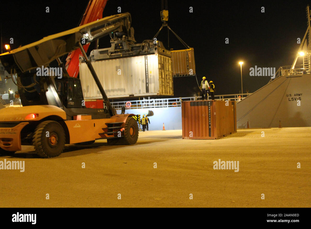 Other country national port workers coordinate with Soldiers of the ...