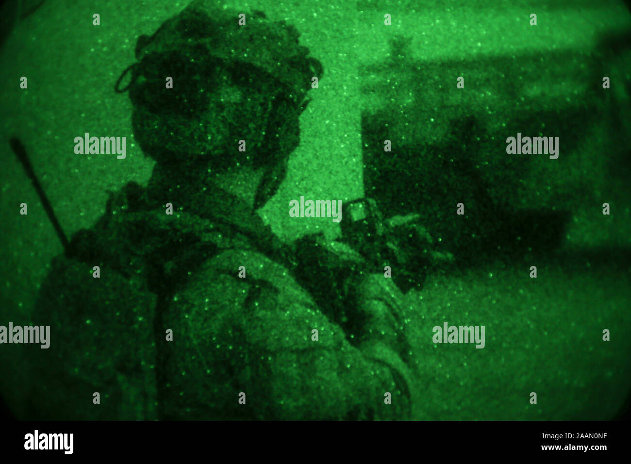 A Marine Raider candidate provides security for Marines performing a ...