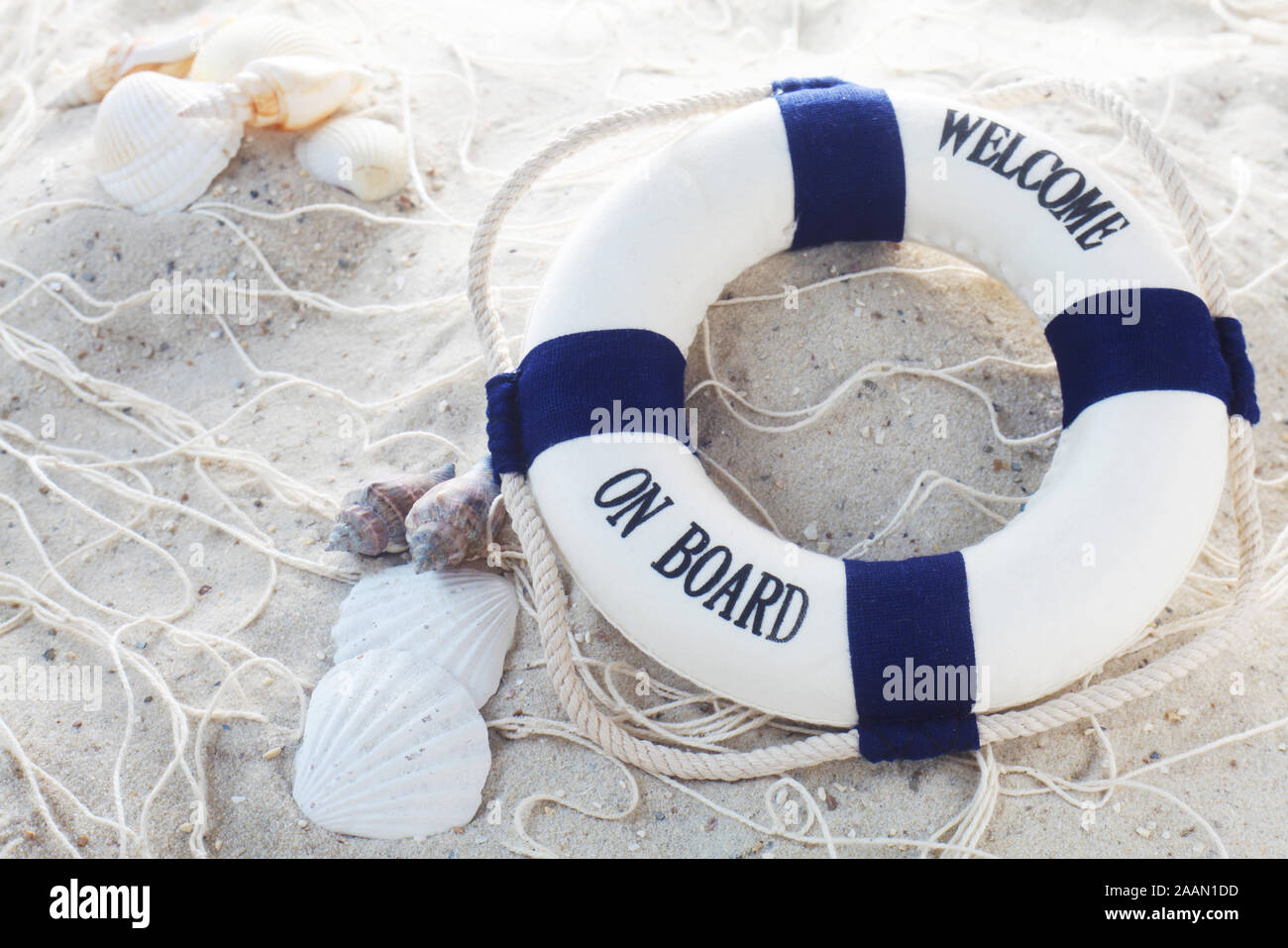 Maritime Still Life With A Lifebouy On Sand Stock Photo - Alamy