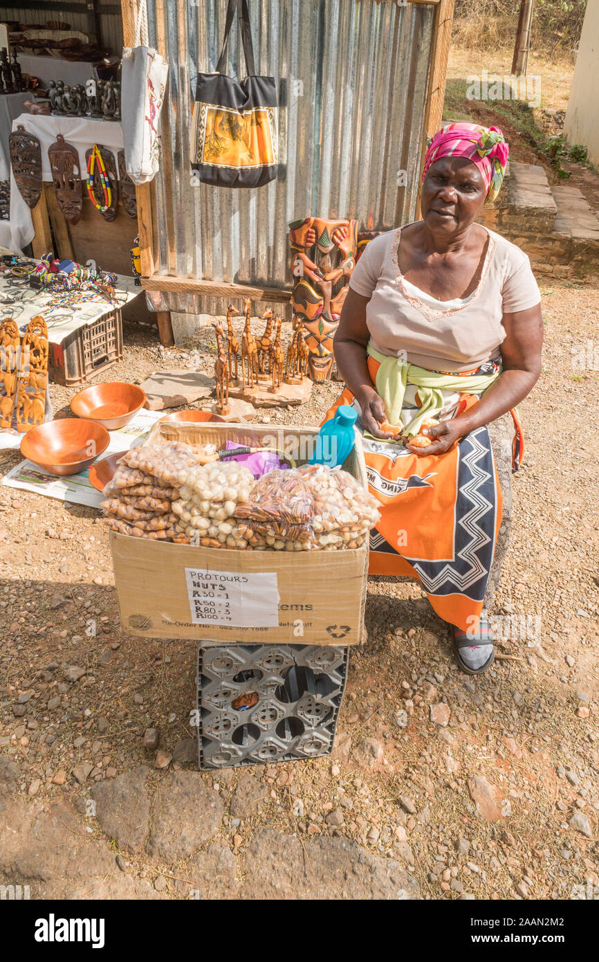 African street vendor or hawker sells Macadamia and Pecan nuts on the ...
