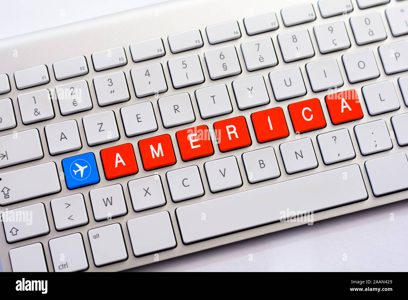 AMERICA writing on white keyboard with a aircraft sketch Stock Photo ...