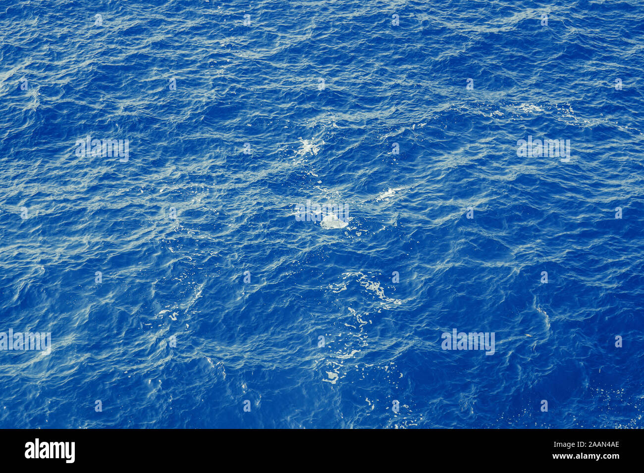 Blue sea surface background with waves aerial view Stock Photo - Alamy