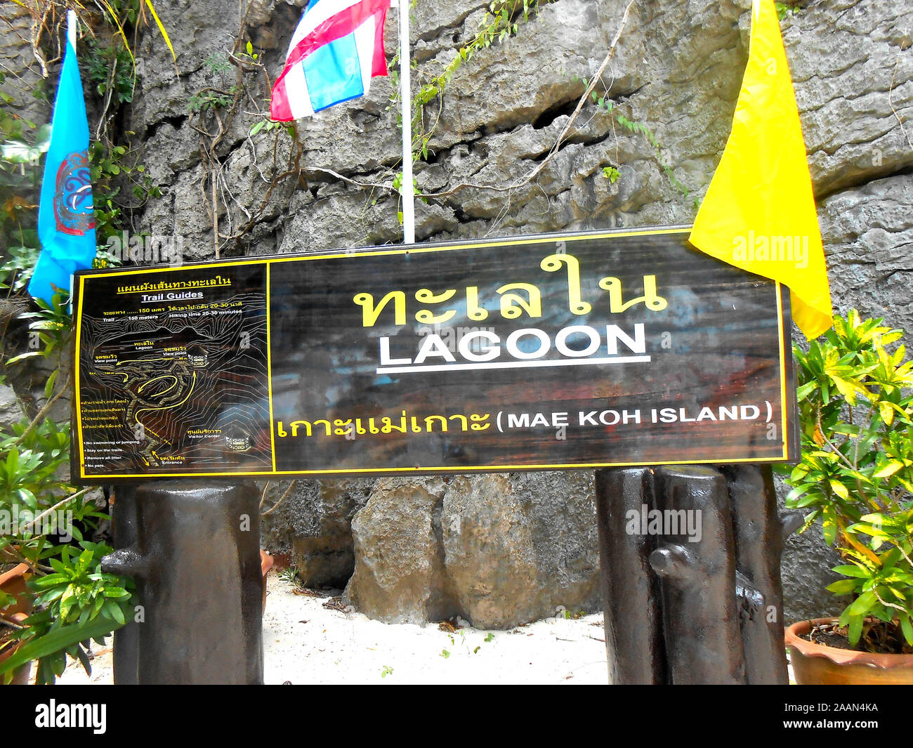 The sign for Mae Koh Island on the beach in front of a rock face in Mu ...