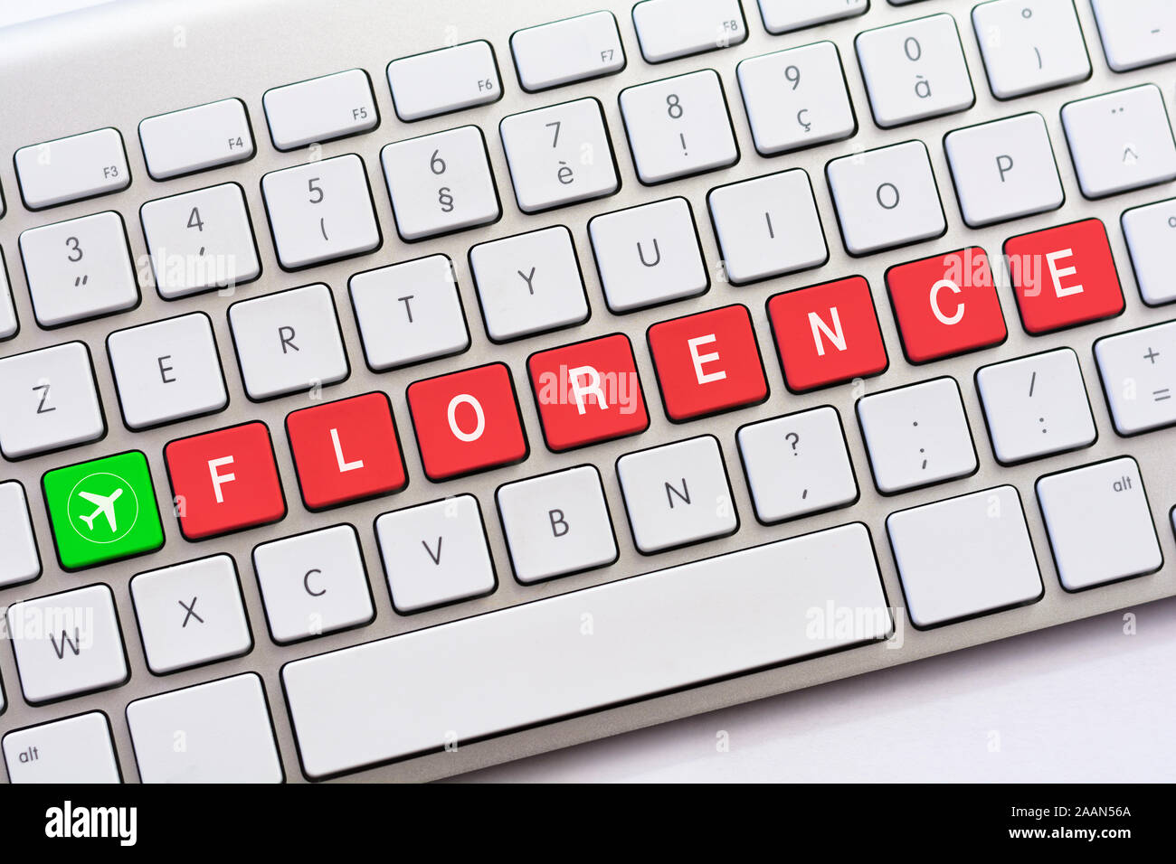 FLORENCE writing on white keyboard with a aircraft sketch Stock Photo ...