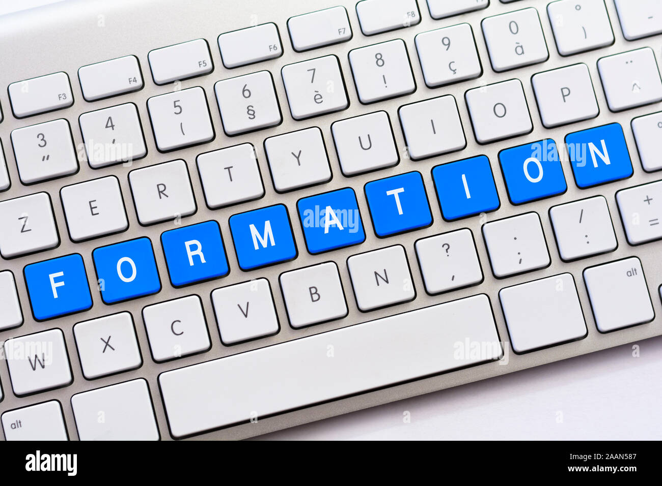 FORMATION writing on white keyboard Stock Photo - Alamy