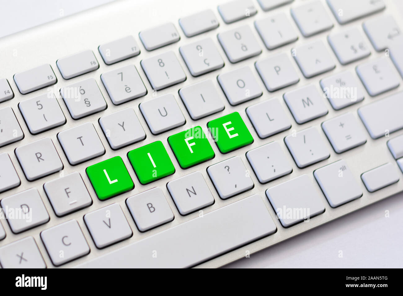 LIFE writing on white keyboard Stock Photo - Alamy