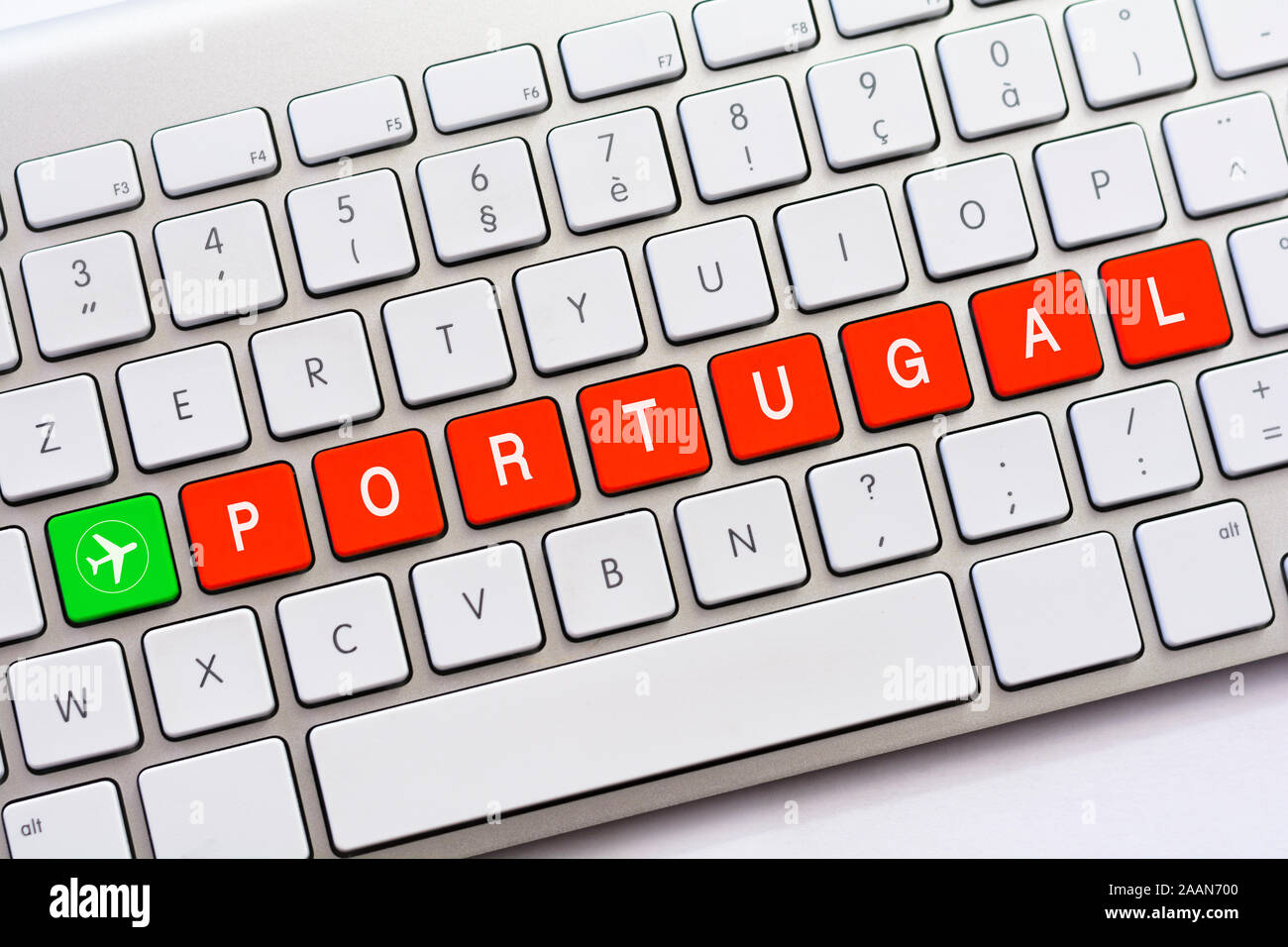PORTUGAL writing on white keyboard with a aircraft sketch Stock Photo ...