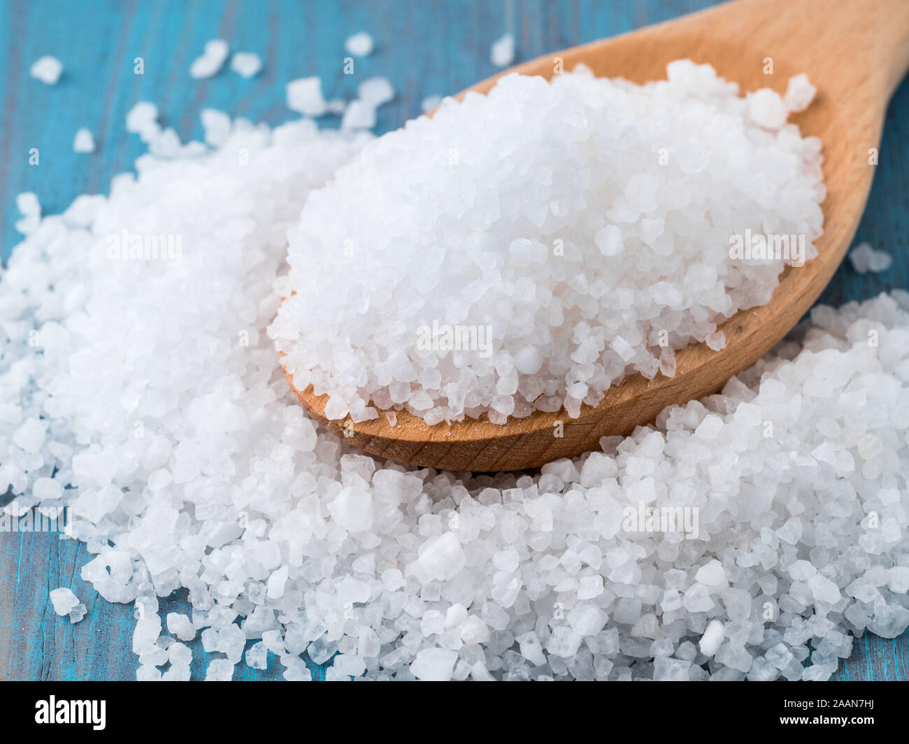 large wooden spoon with big sea salt for the bright blue wooden ...