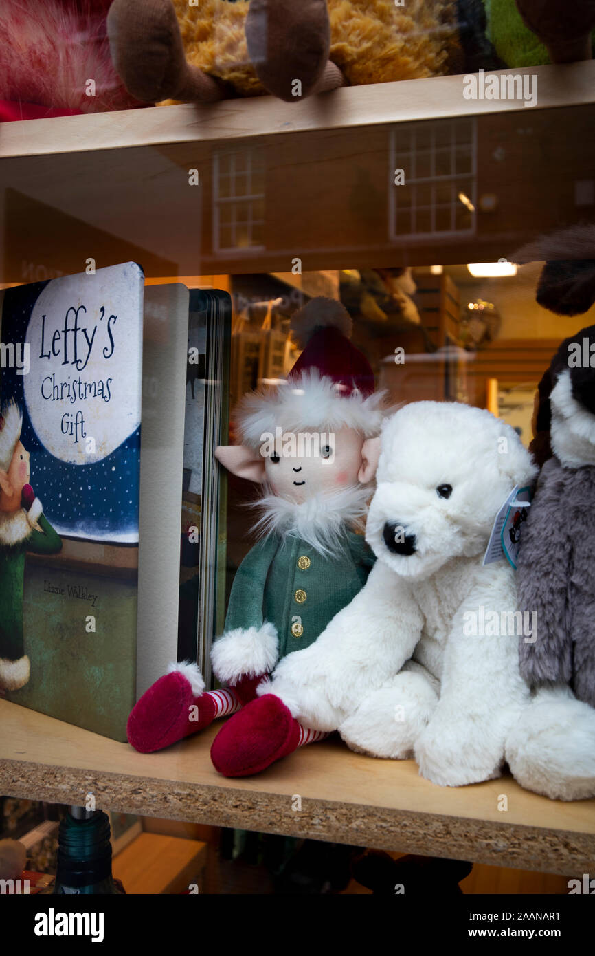 festive Christmas shop window display of soft cuddly toys on sell for ...