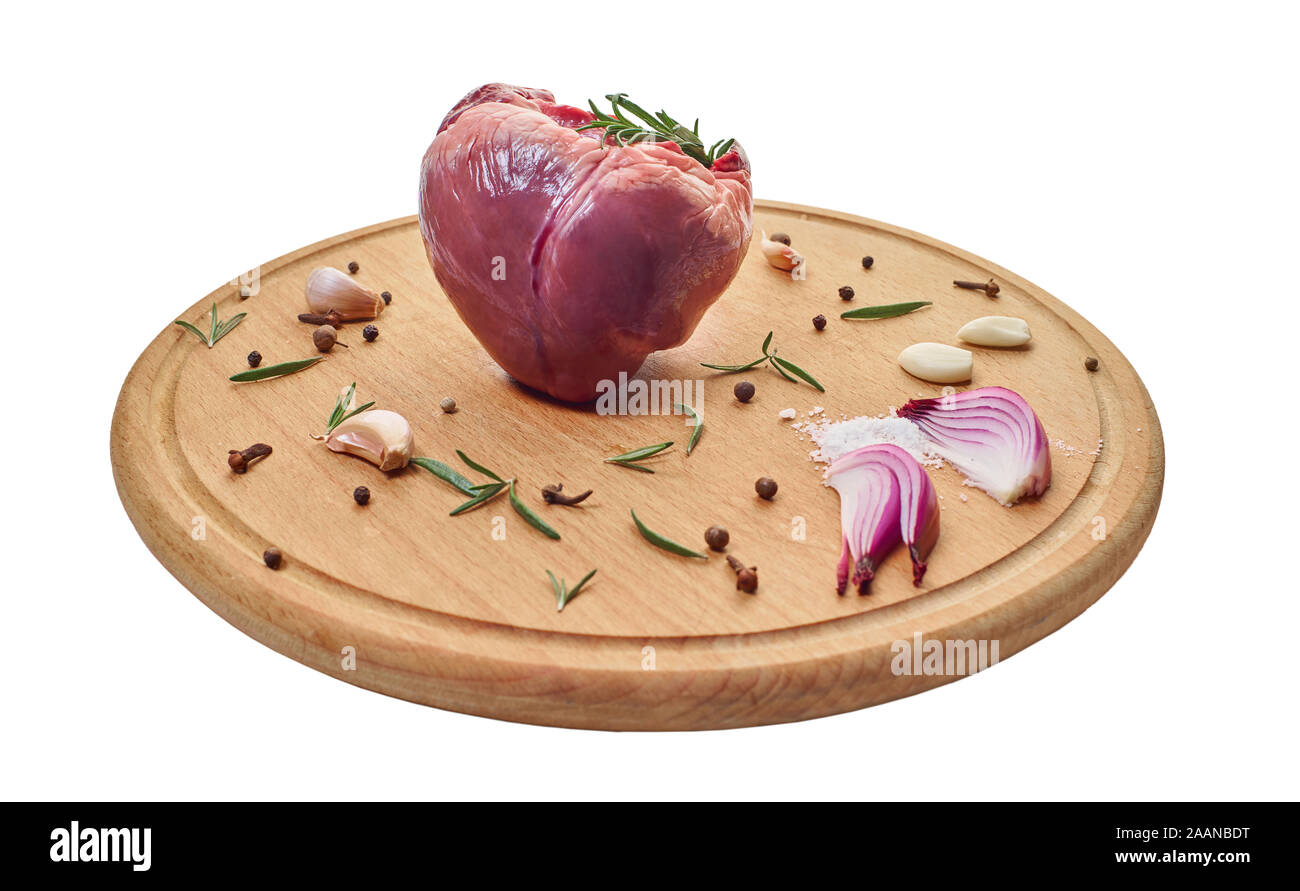 raw meat, beef heart with seasonings, white isolated background Stock ...