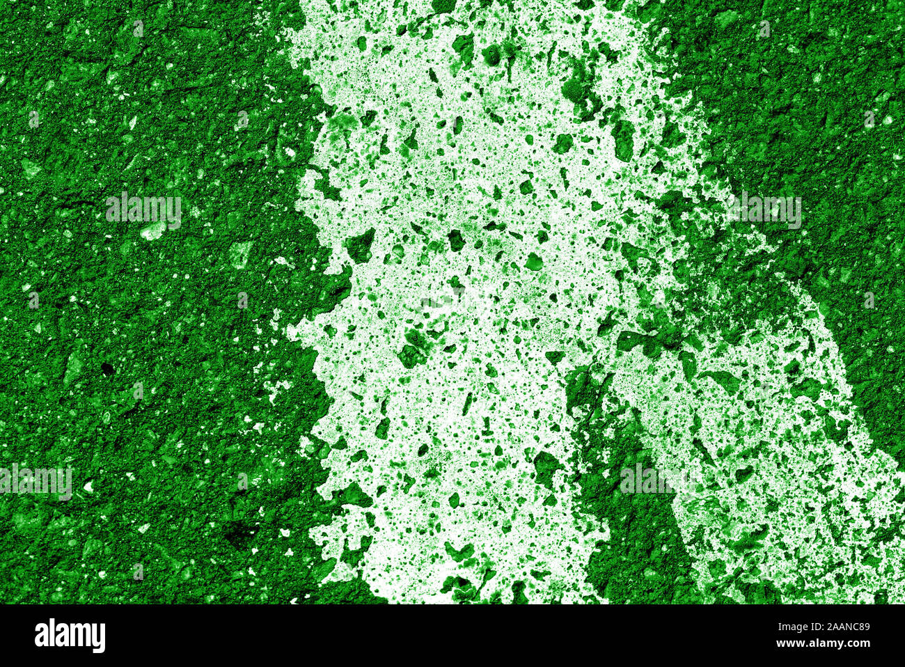 Old asphalt surface with white paint close-up, top view. Abstract ...