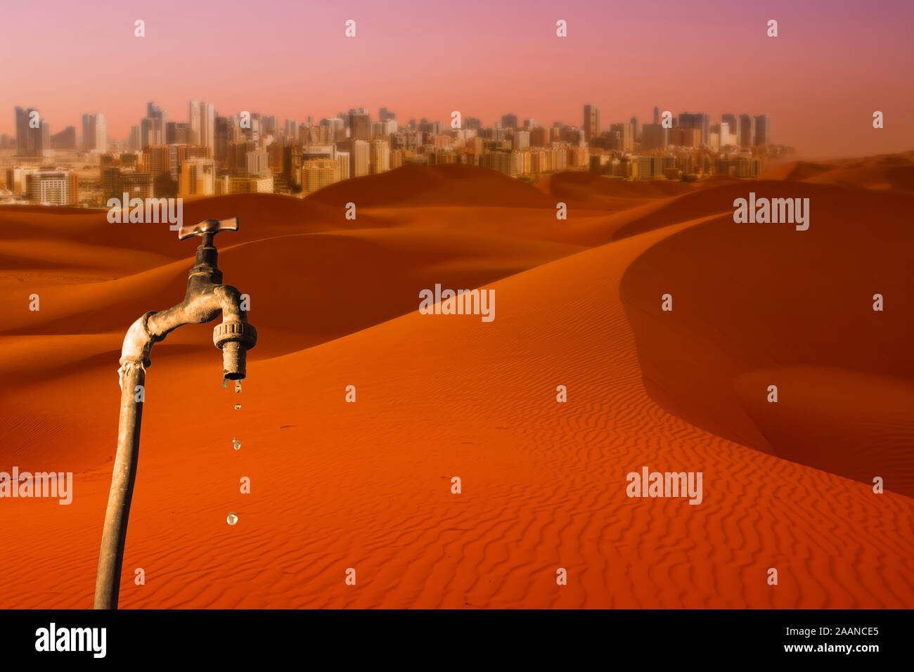 Dripping tap, desert and skyline of big city in the background, concept ...