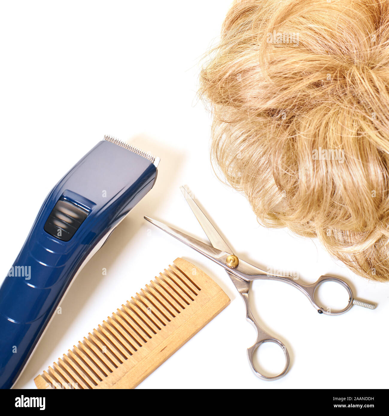haircut tool and hair on a white background Stock Photo - Alamy
