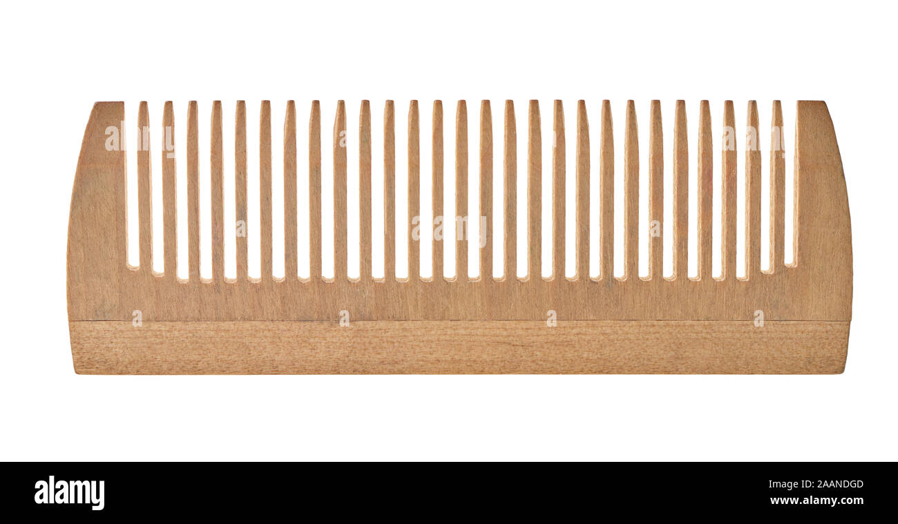 wooden new comb on a white isolated background Stock Photo - Alamy