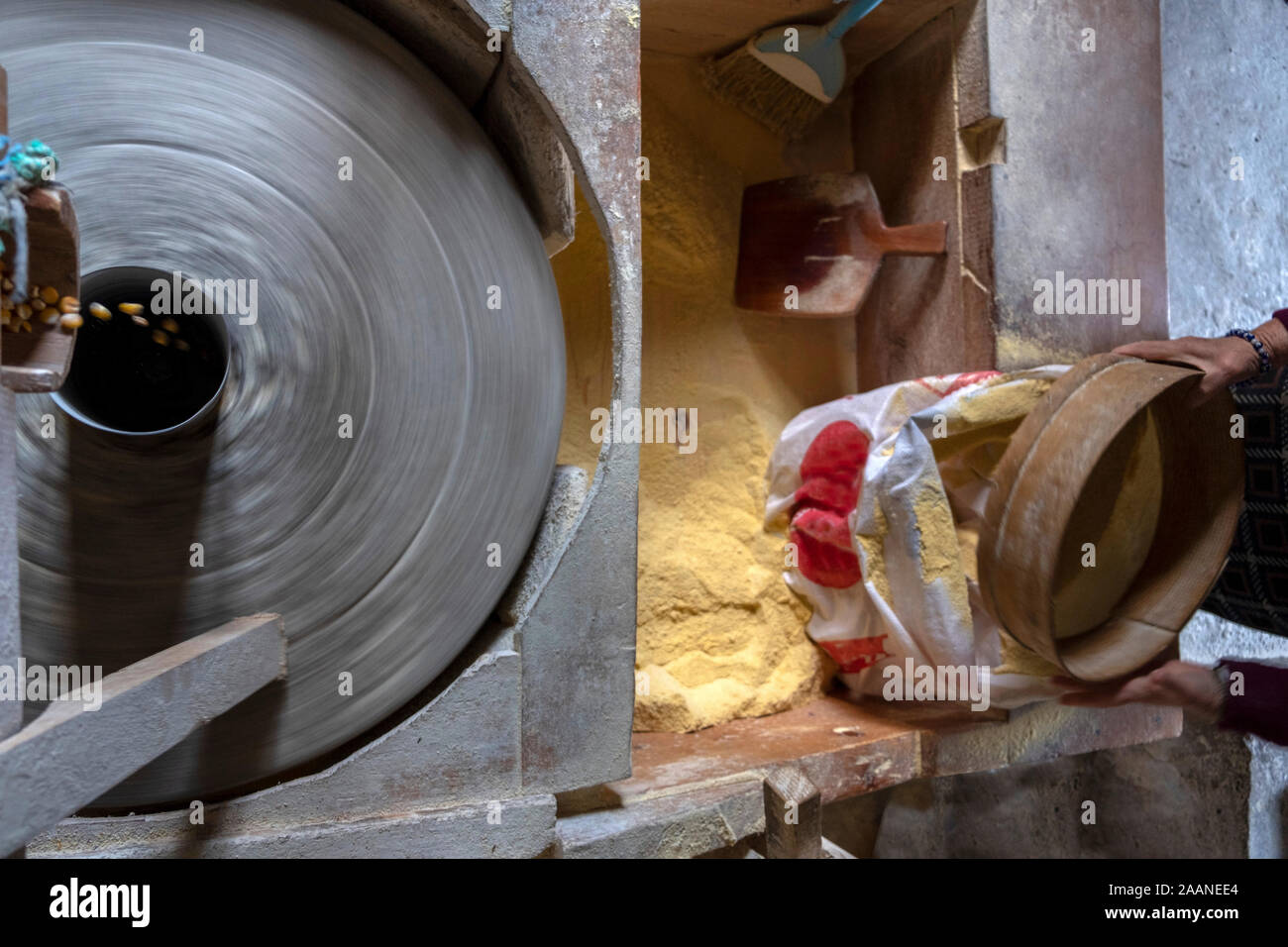old woman grinding corn in an old water mill in tonya trabzon Stock ...