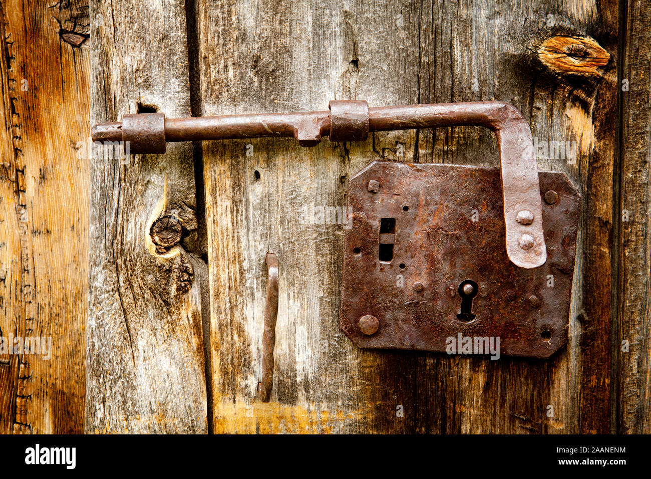 antique latch on larch door details Stock Photo - Alamy