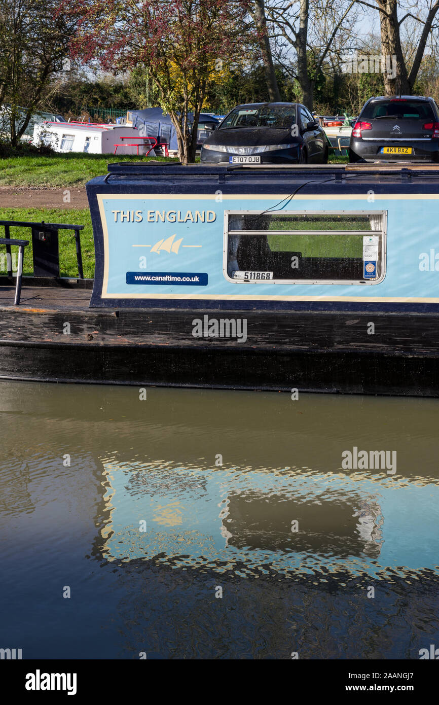 Narrowboat, called This England, with reflections at Gayton Marina ...