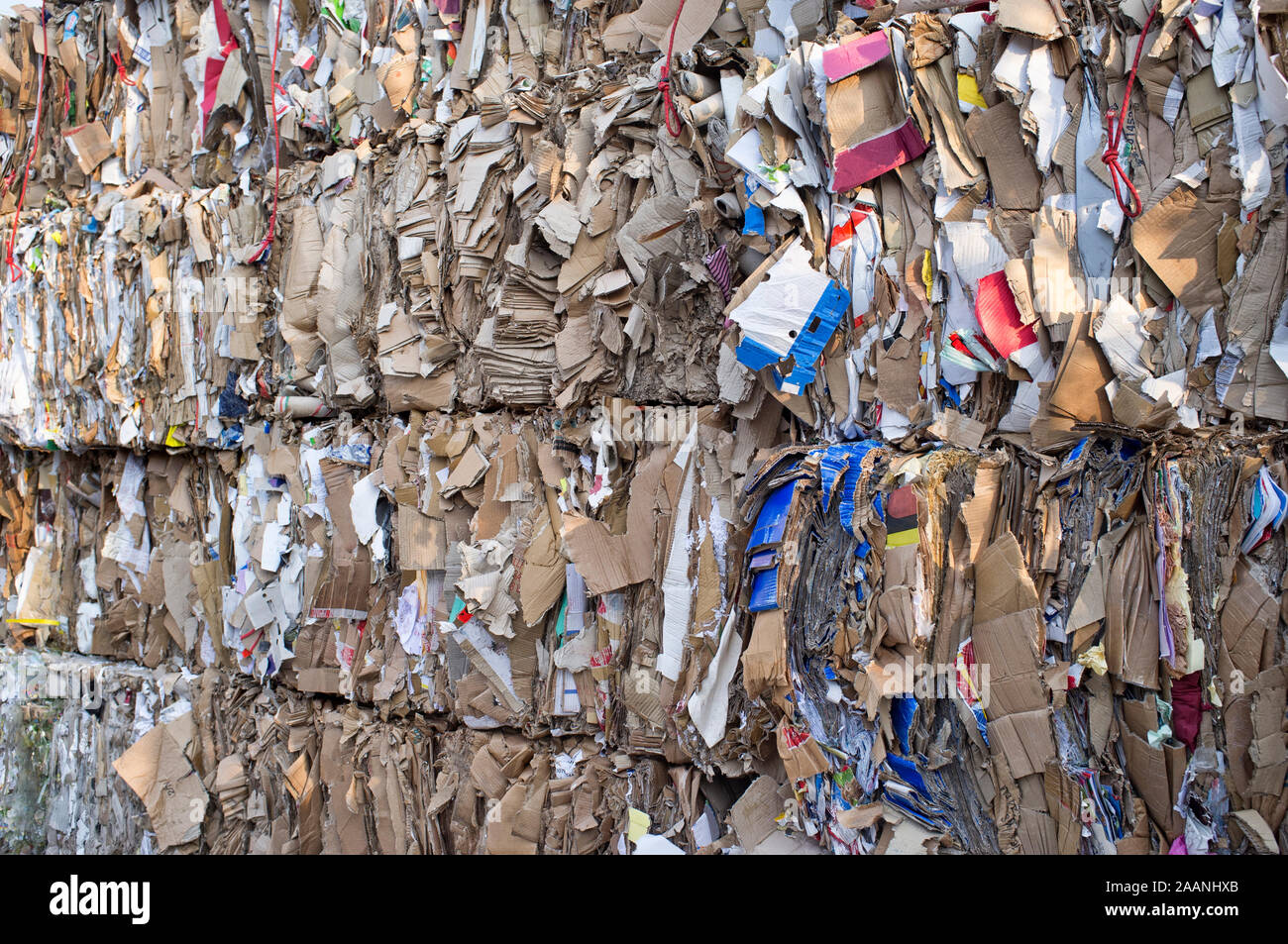 compressed paper and cardboard waiting recycling Stock Photo - Alamy