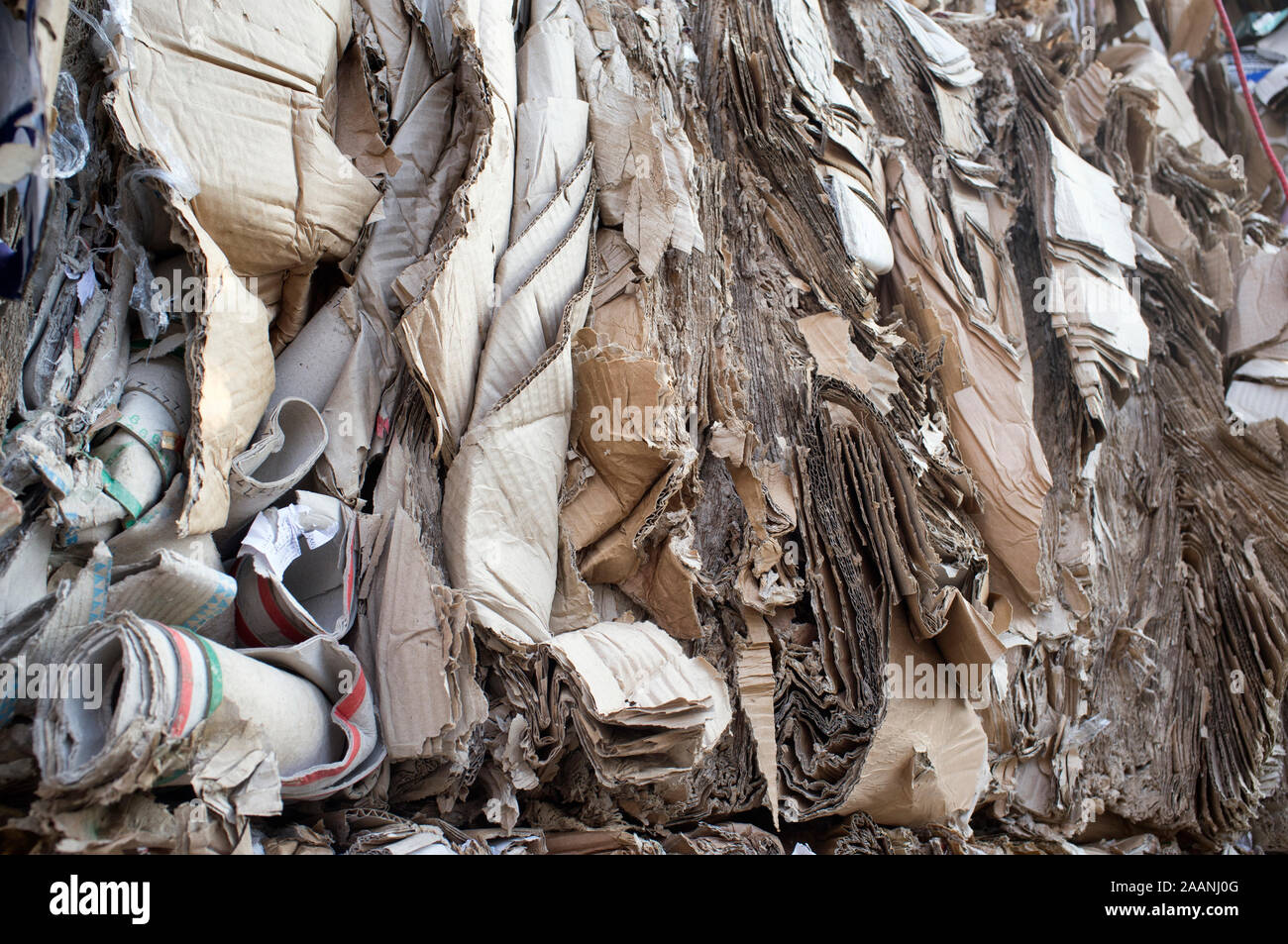 compressed paper and cardboard waiting recycling Stock Photo - Alamy