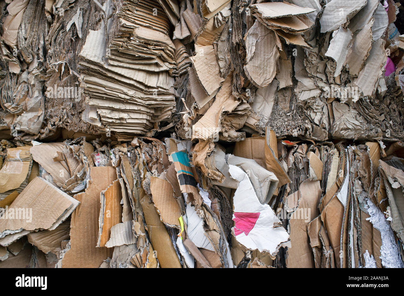 compressed paper and cardboard waiting recycling Stock Photo - Alamy