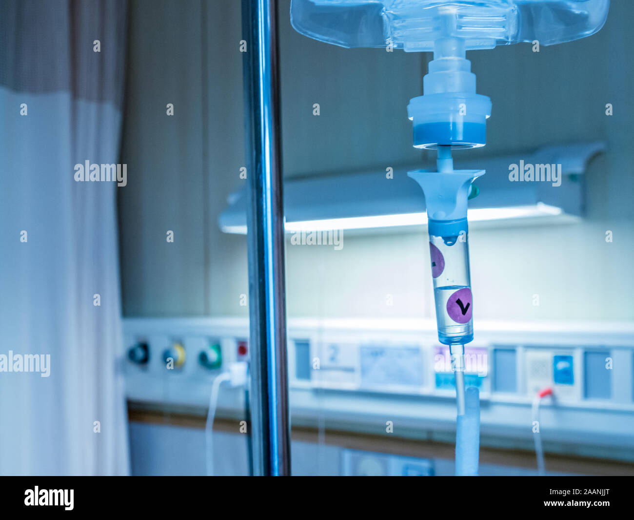 IV saline drip in hospital room for patient Stock Photo - Alamy
